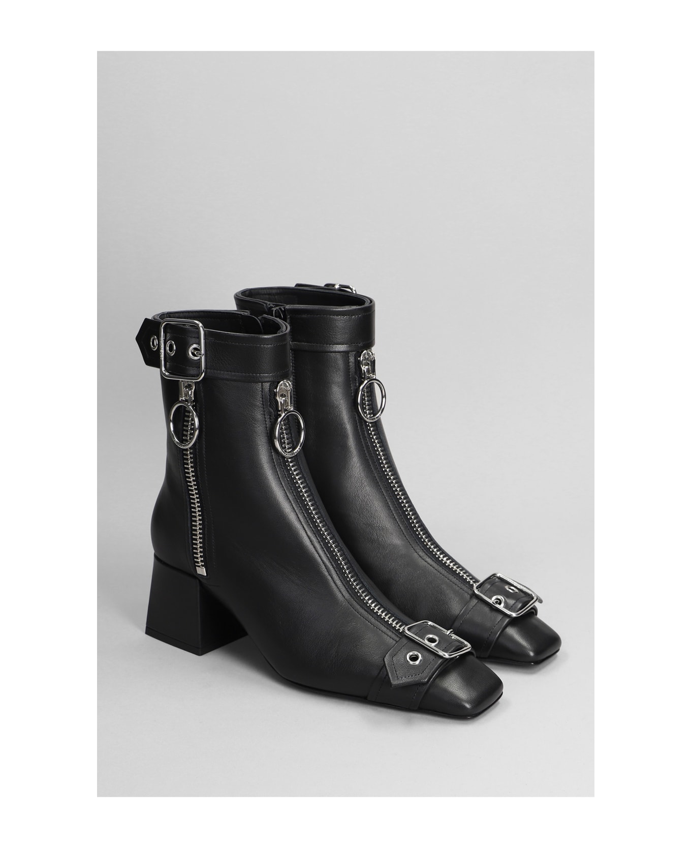 Courrèges Low Heels Ankle Boots In Black Leather | italist, ALWAYS LIKE ...