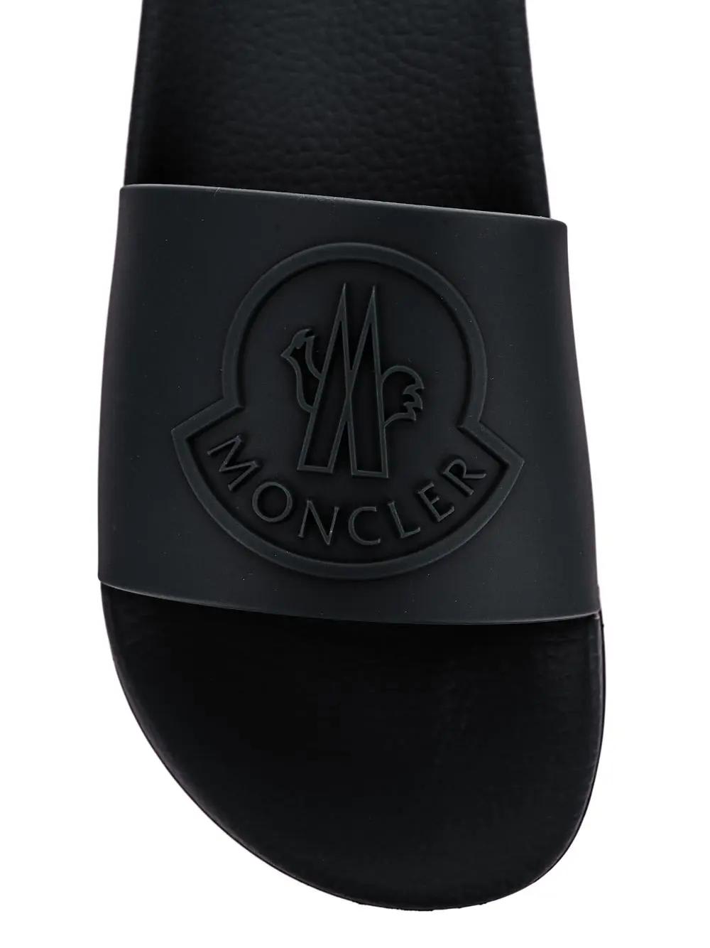 Moncler Logo Slides In Black | ModeSens